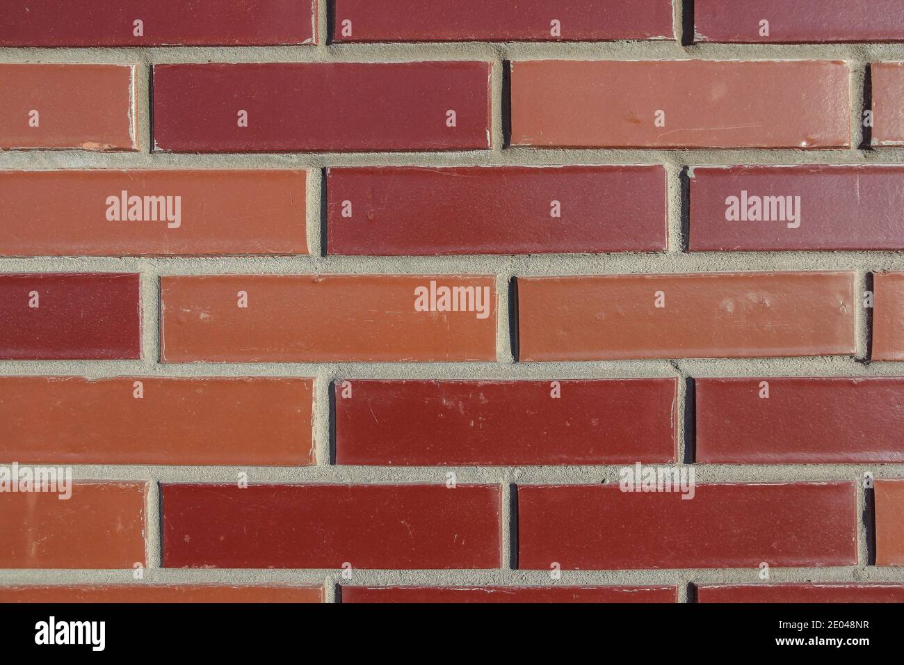 Brick wall background. Fresh brickwork. The work of a bricklayer ...