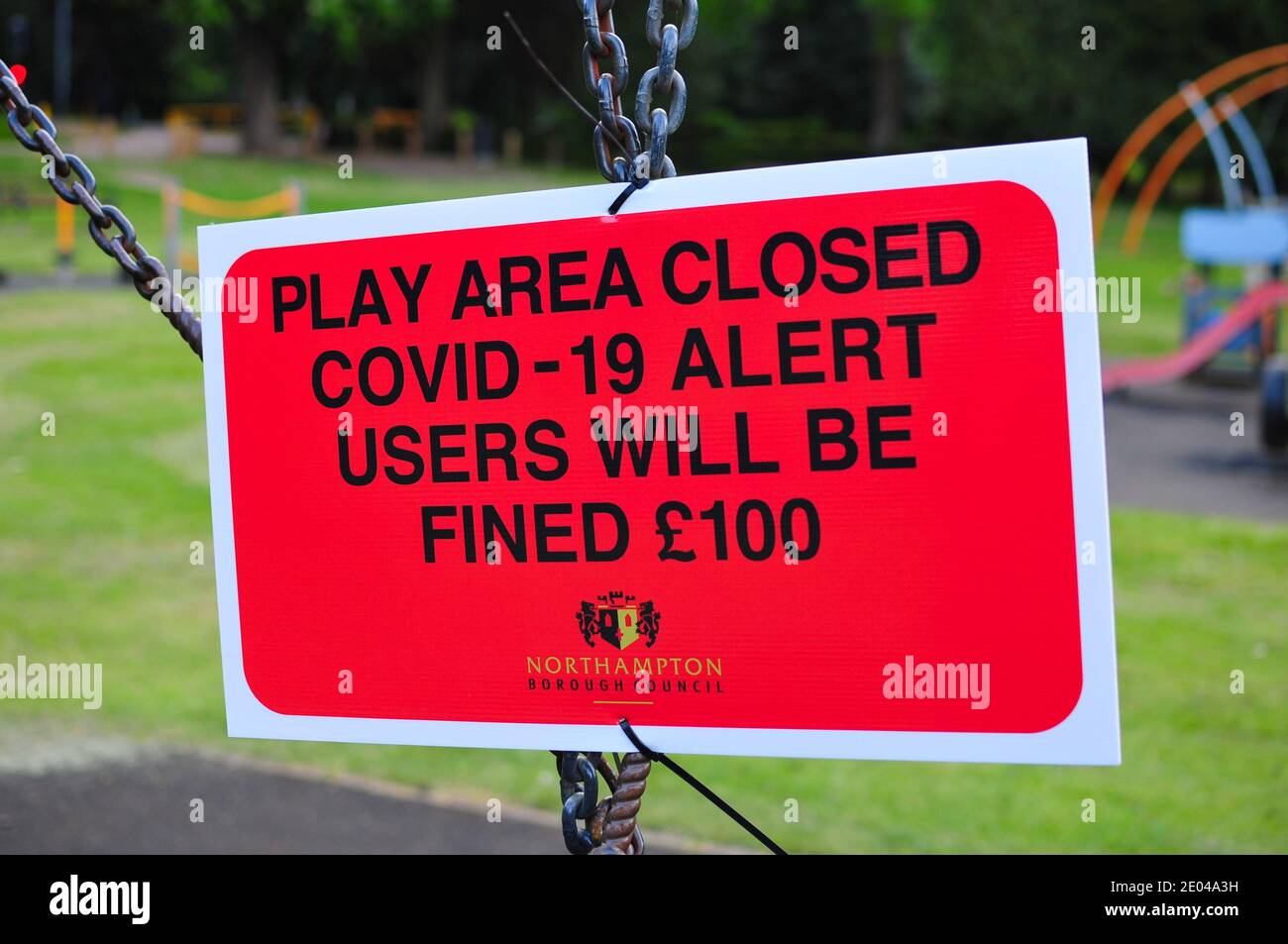 Covid 19 warning park signs Stock Photo - Alamy