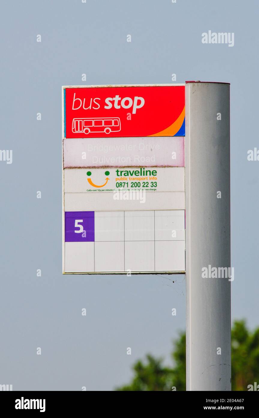 Bus stop sign in England UK Stock Photo - Alamy