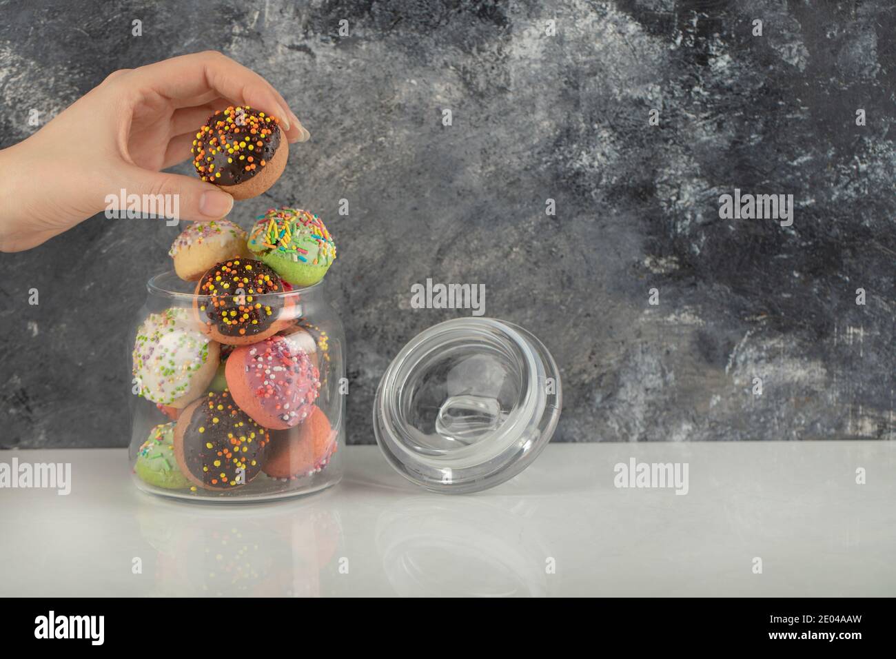 Woman taking tasty baked hi-res stock photography and images - Alamy