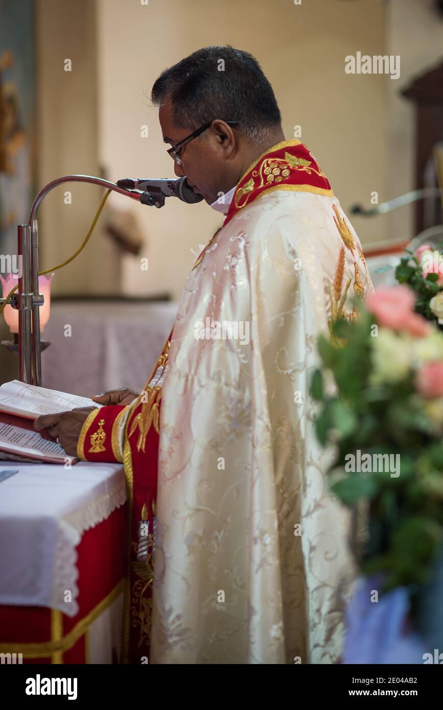 Kerala, India, 08-12-2017. Priest at ceremony. Catholic wedding in the ...