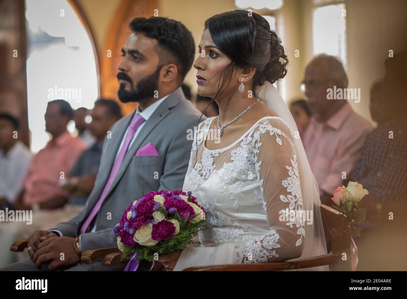 Kerala, India, 08-12-2017. Bride and groom closer to the altar ...