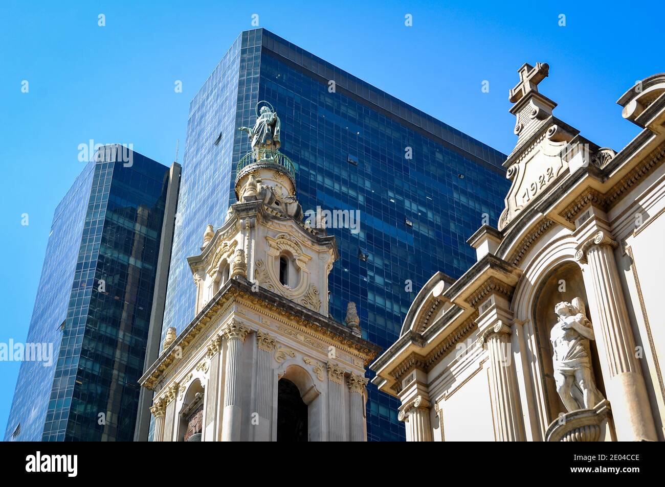 Church Tower with Modern Skyscraper in the Background Stock Photo - Alamy
