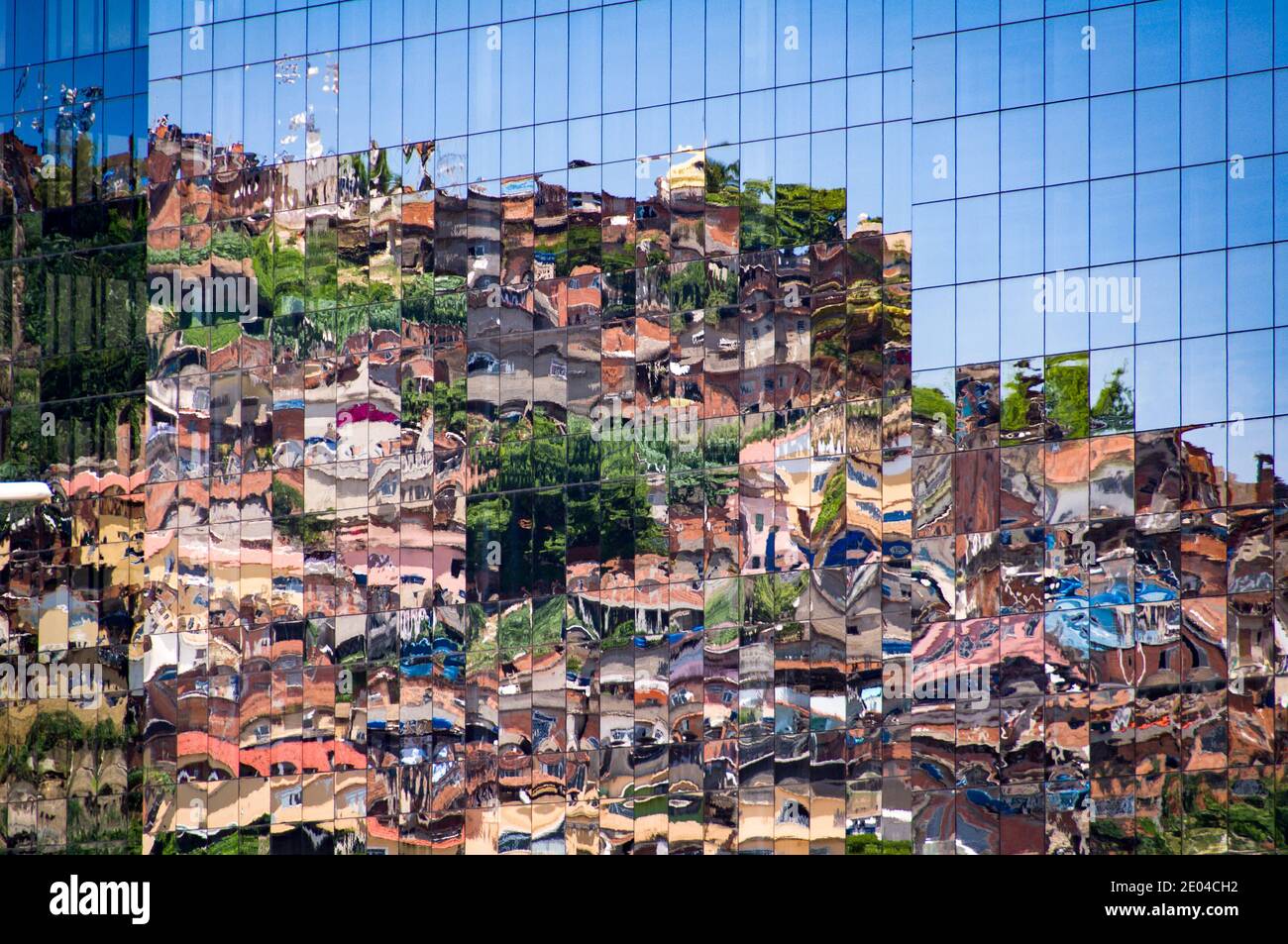 Reflection of Brazilian Slum in Windows of New Modern Business Building ...