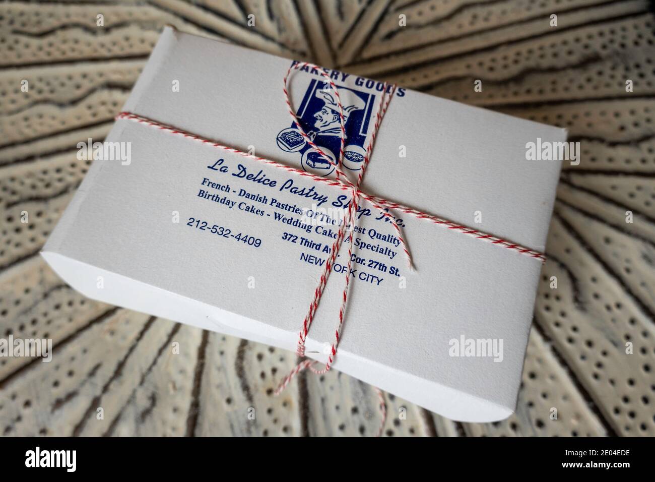 La Delice Pastry Shop cardboard pastry box tied with red and white ...