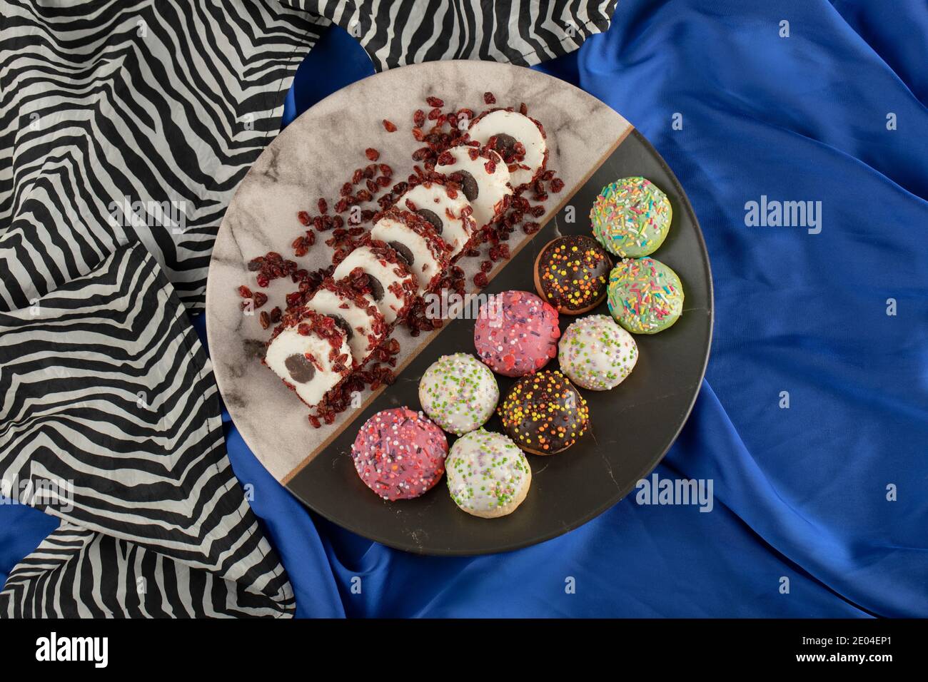 Plate of decorated doughnuts hi-res stock photography and images - Alamy