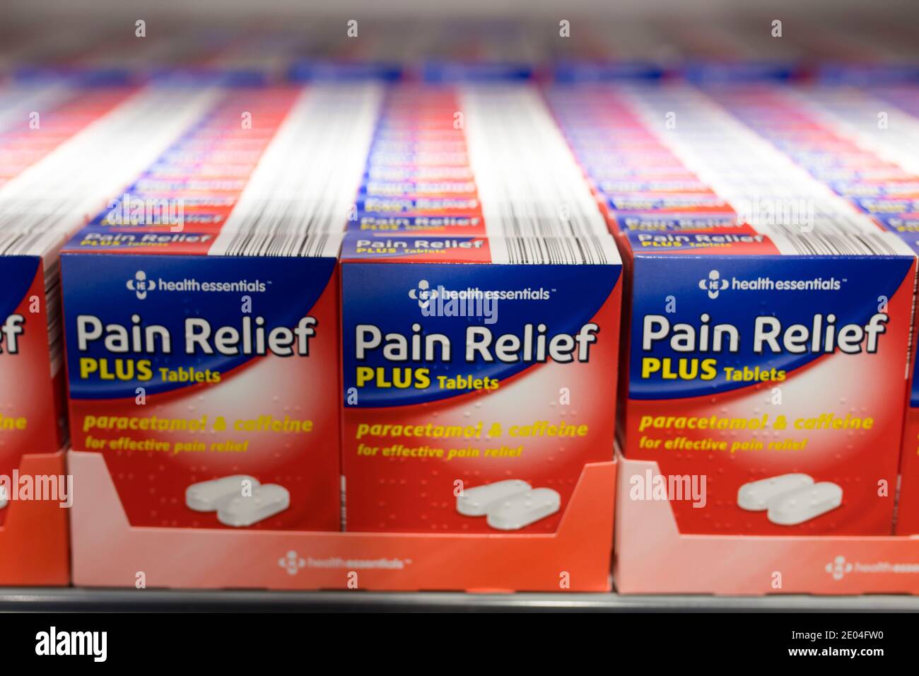 Packets of pain relief tablets on sale in a supermarket in the UK Stock ...