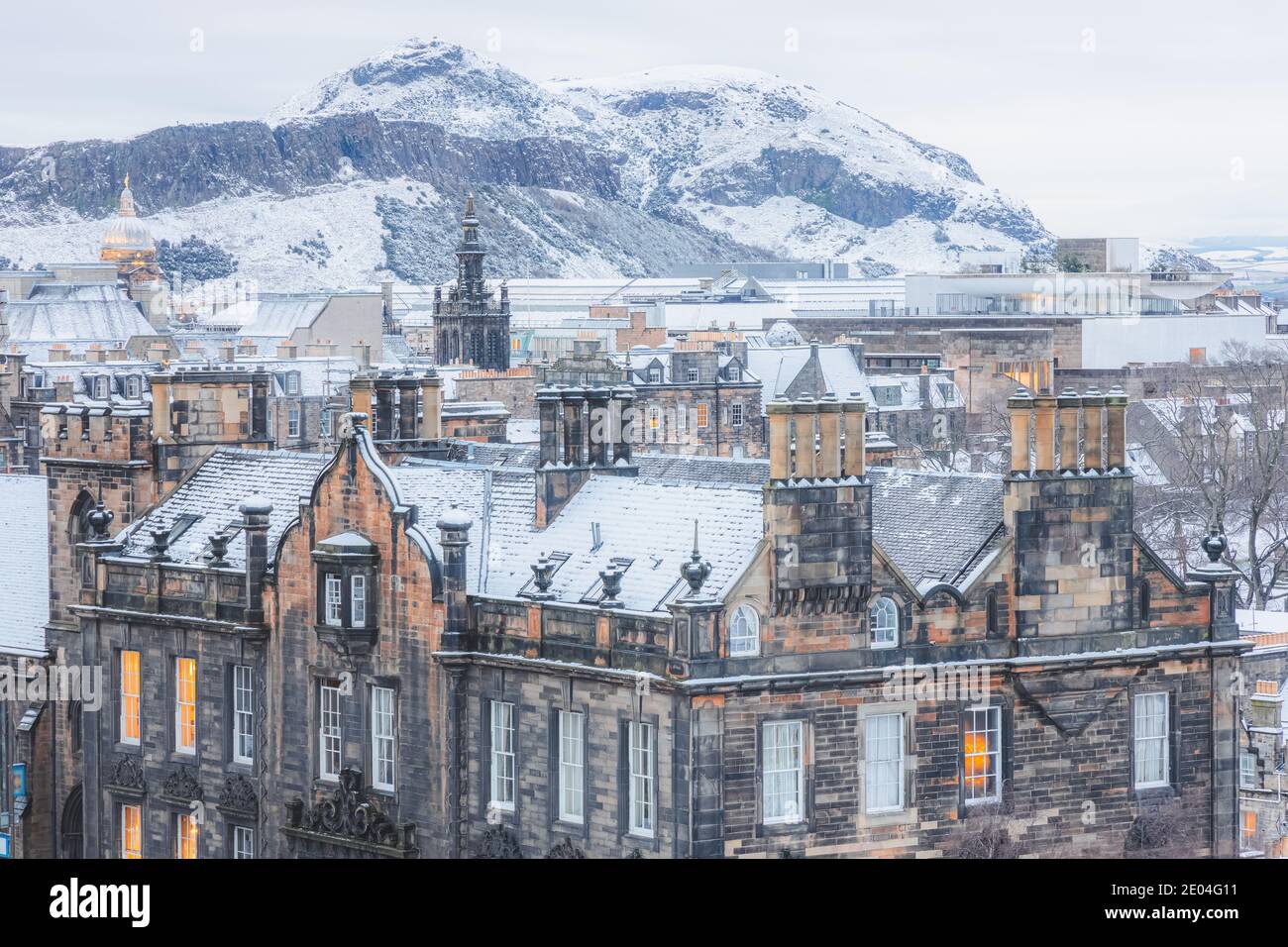 A view from Edinburgh Castle of the old town with Arthur's Seat in the ...