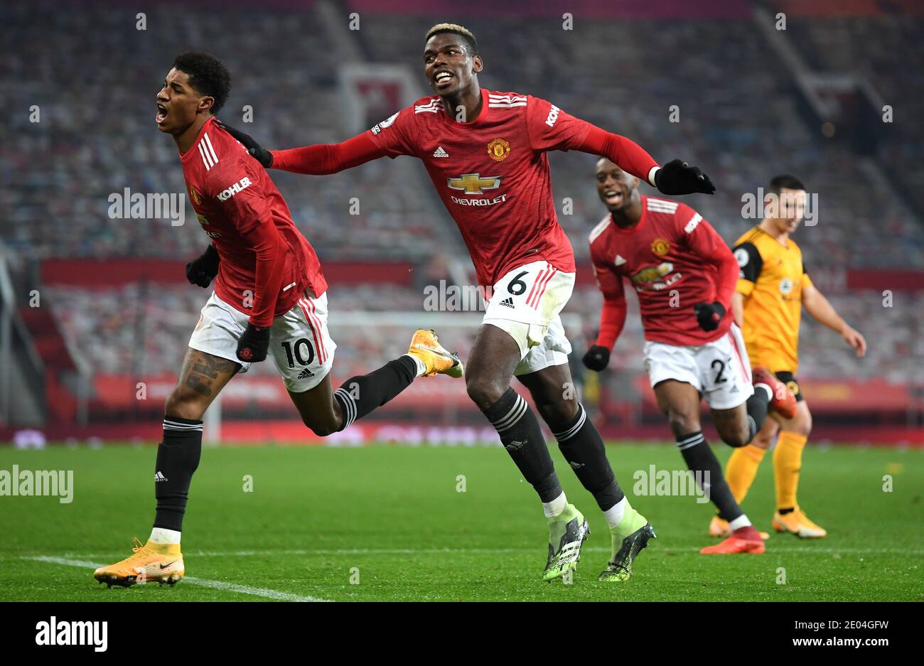Manchester United's Marcus Rashford (left) celebrates scoring his side ...