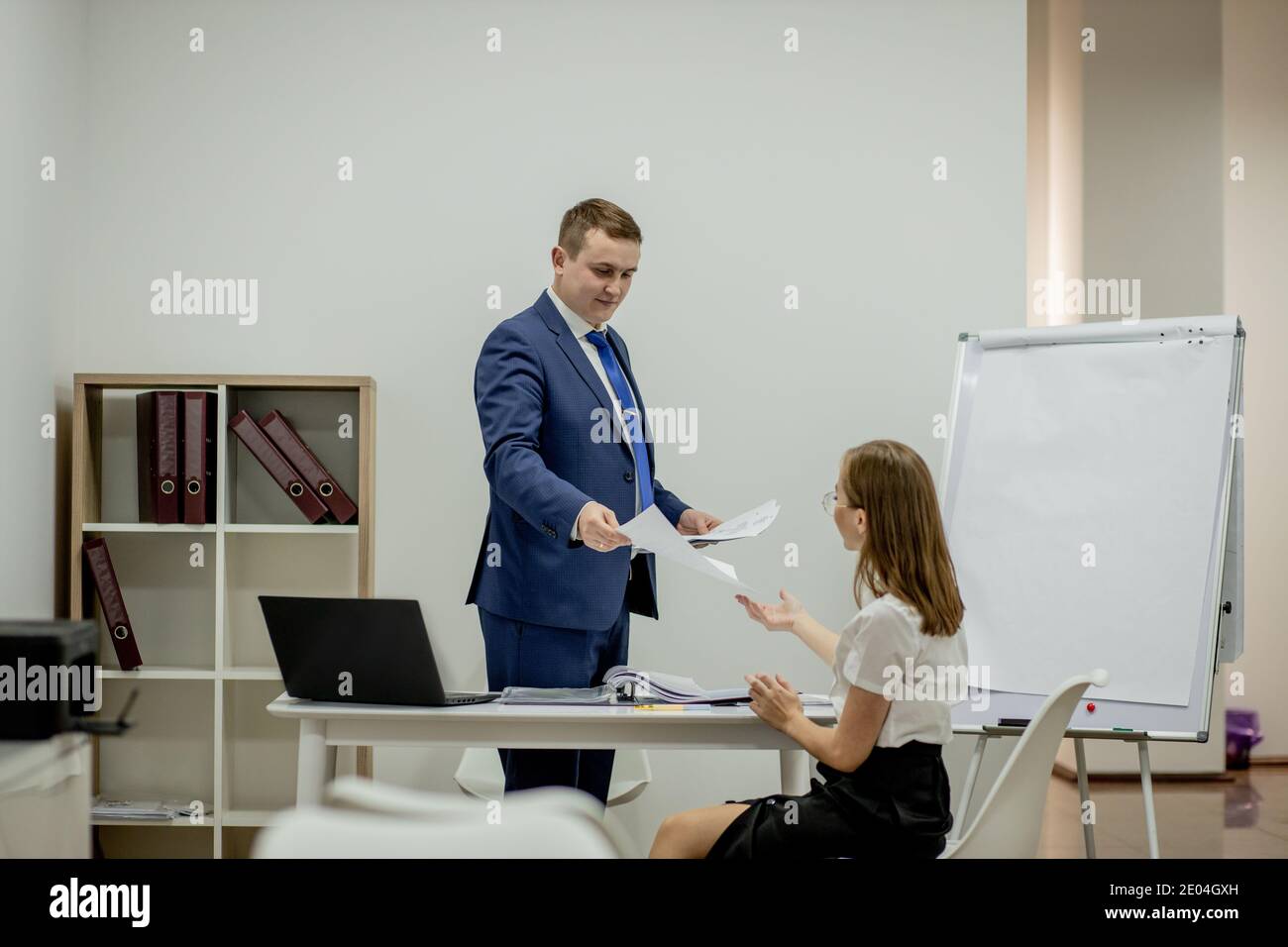 Male secretary to female boss hi-res stock photography and images - Alamy