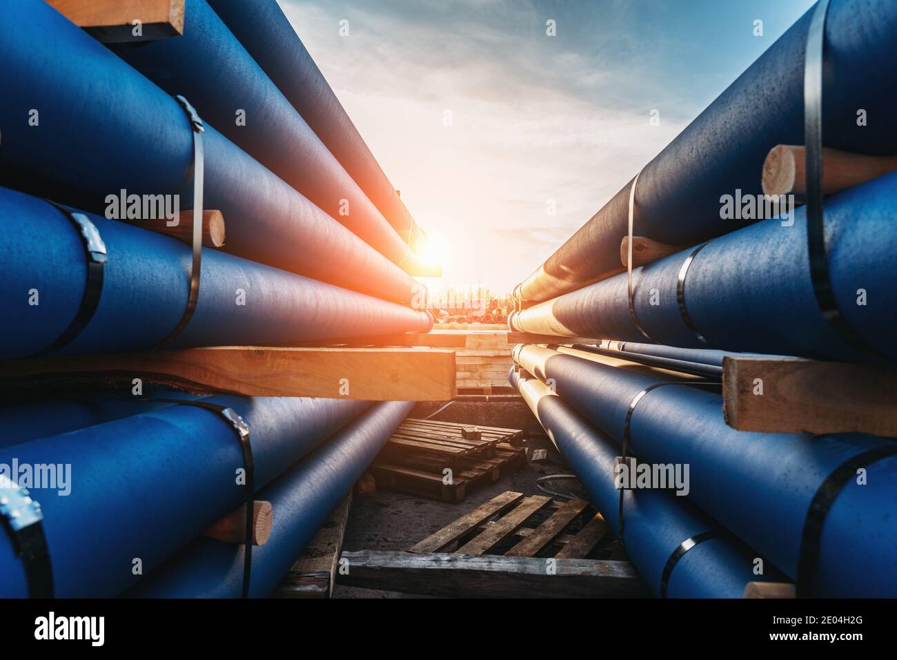 Stack of Cast iron pipes for sewerage ready for transportation and ...