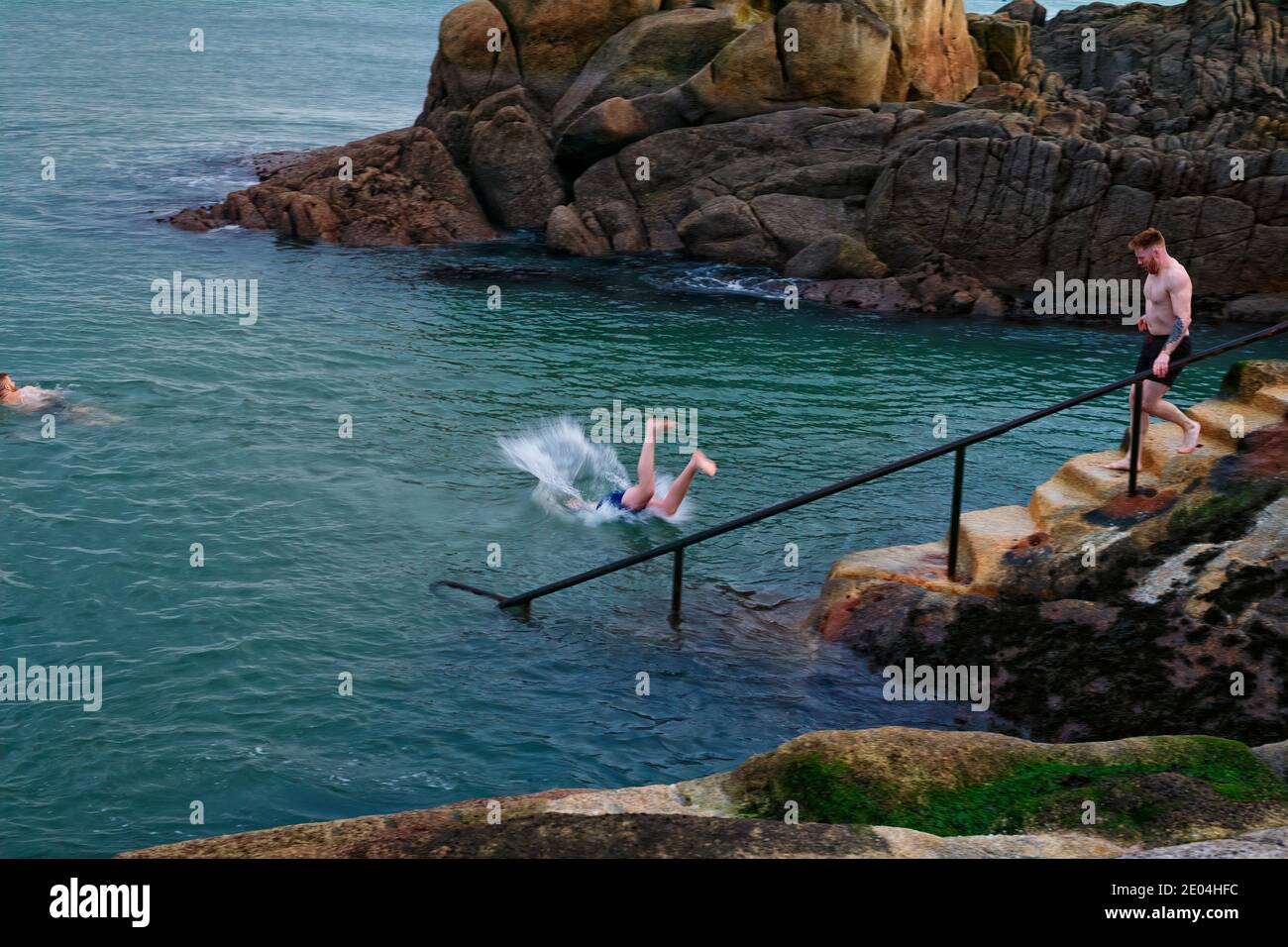 Winter Swimmers. Sandycove Forty Foot bathing area Dun Laoghaire near ...