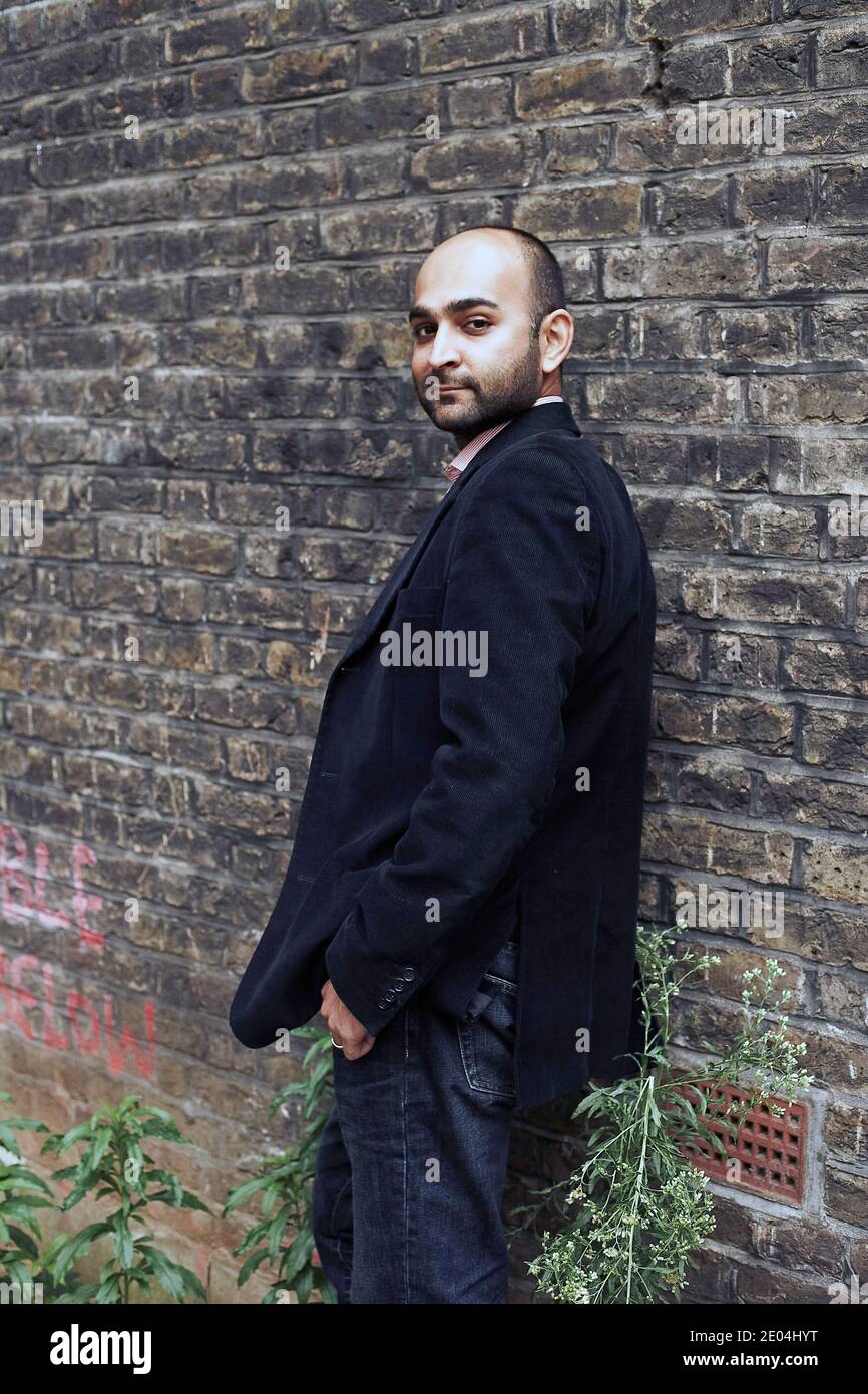 Author Mohsin Hamid poses for photographs in London Stock Photo - Alamy
