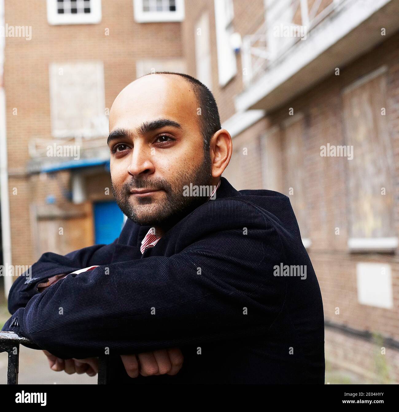 Author Mohsin Hamid poses for photographs in London Stock Photo - Alamy