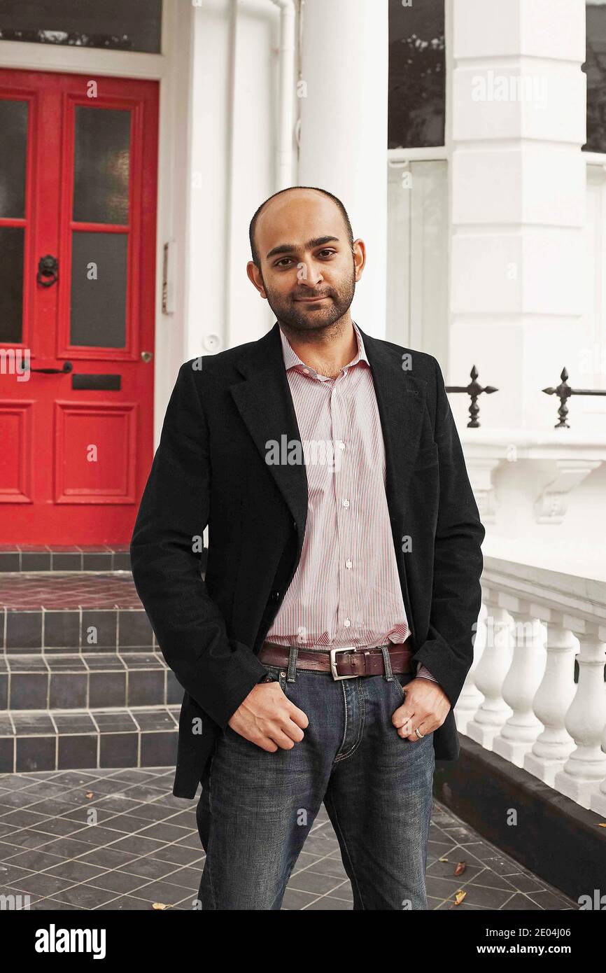 Author Mohsin Hamid poses for photographs in London Stock Photo - Alamy