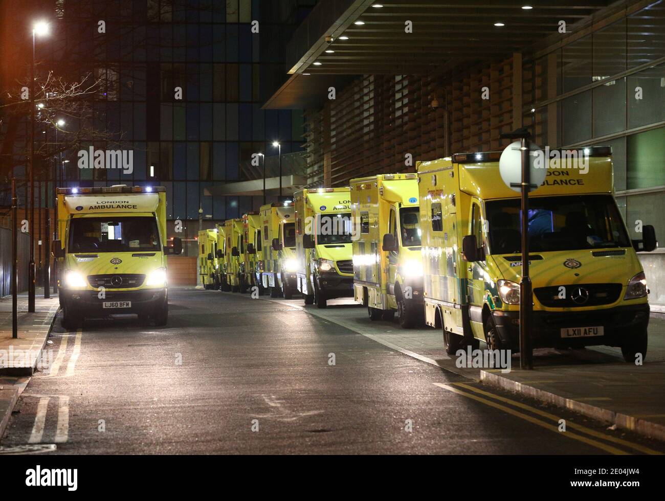 Ambulances queued outside the Royal London Hospital, in London Stock ...
