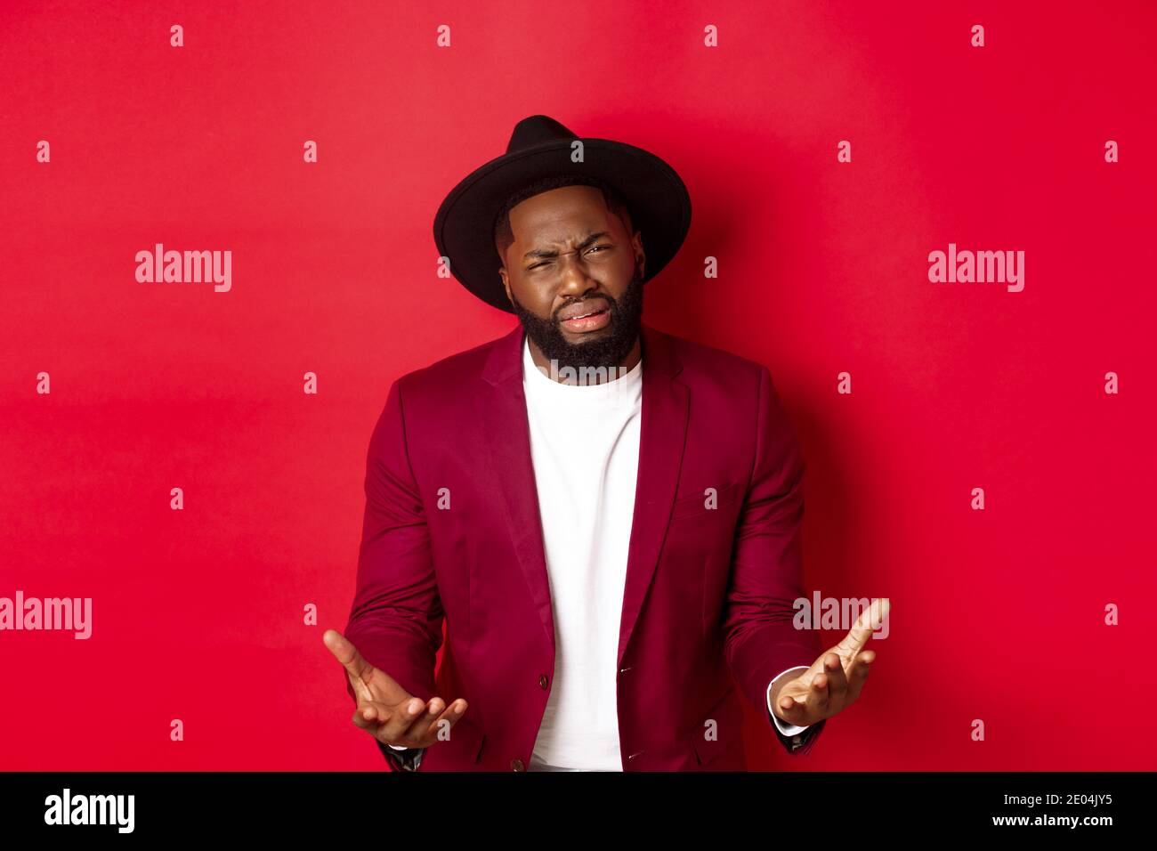 Frustrated and miserable african american man whining, complaining on ...