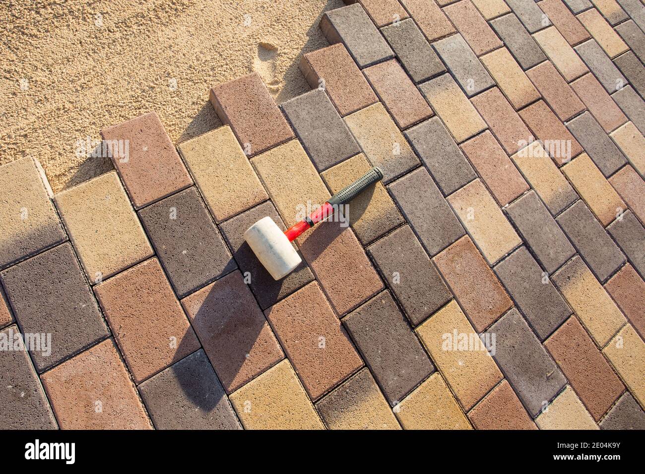 Making pavement in a garden Stock Photo - Alamy