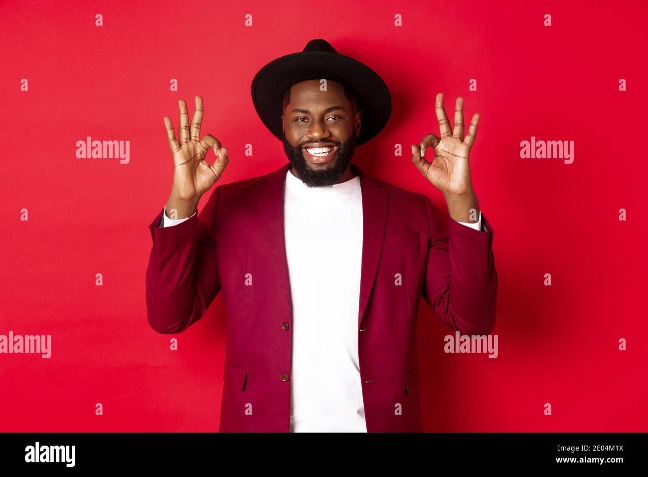 Christmas shopping and people concept. Satisfied african american male ...