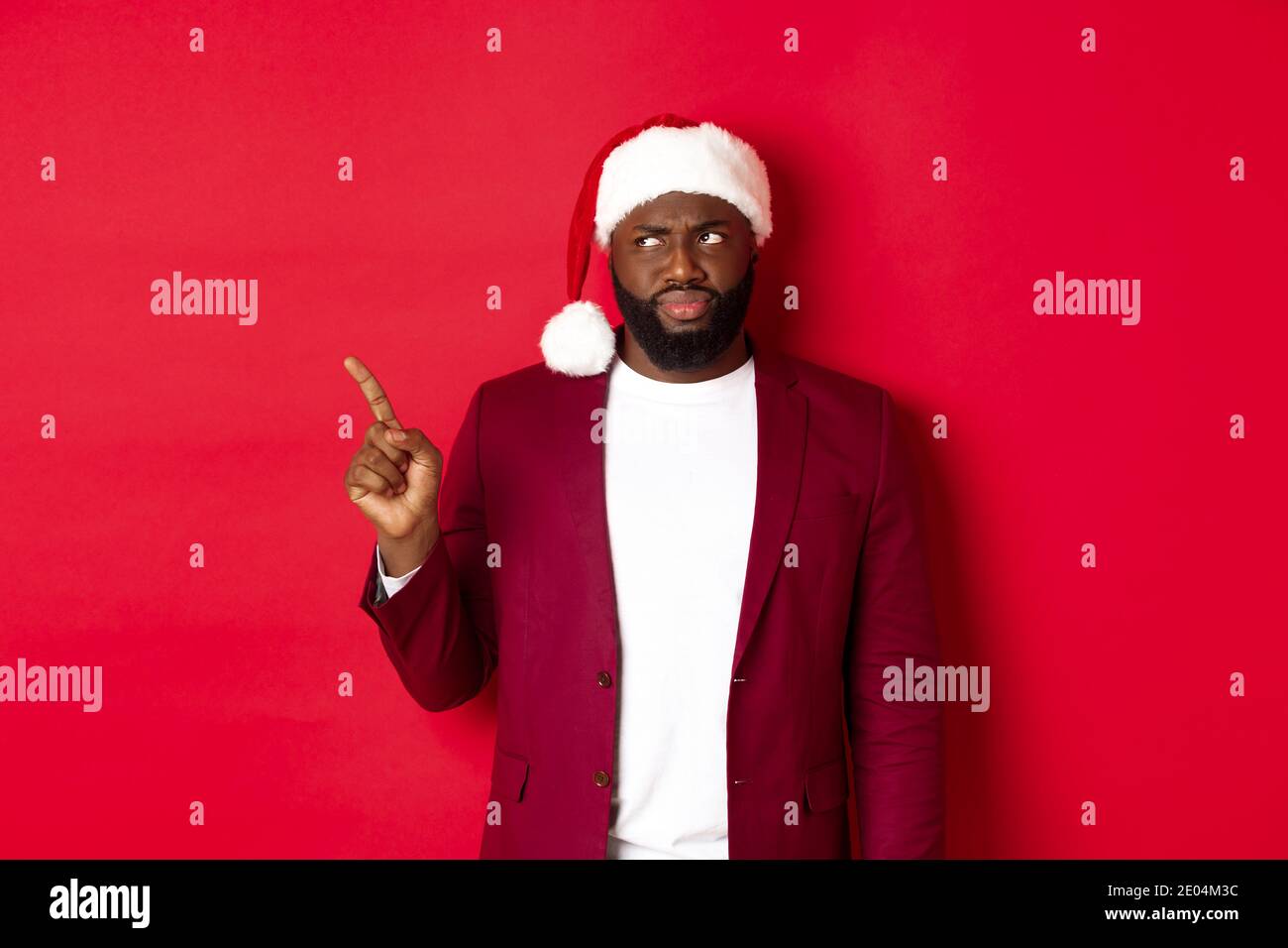 Christmas, party and holidays concept. Skeptical and gloomy african ...