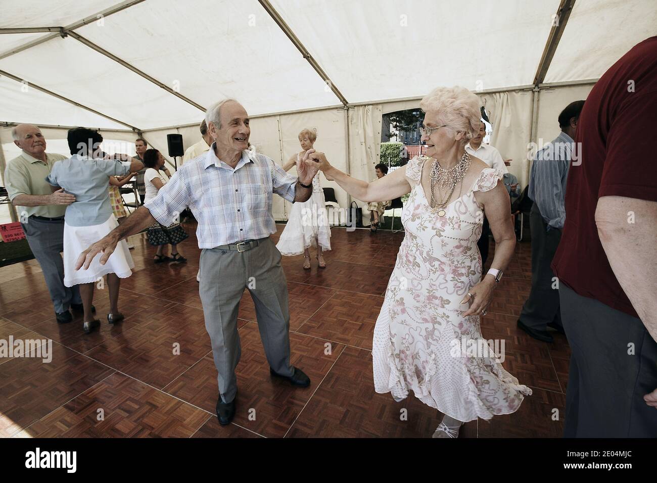 Happy older couple is dancing together Stock Photo - Alamy
