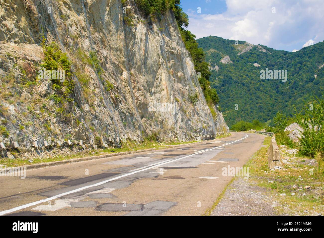 Patches on asphalt on the motorway in East Serbia Stock Photo - Alamy