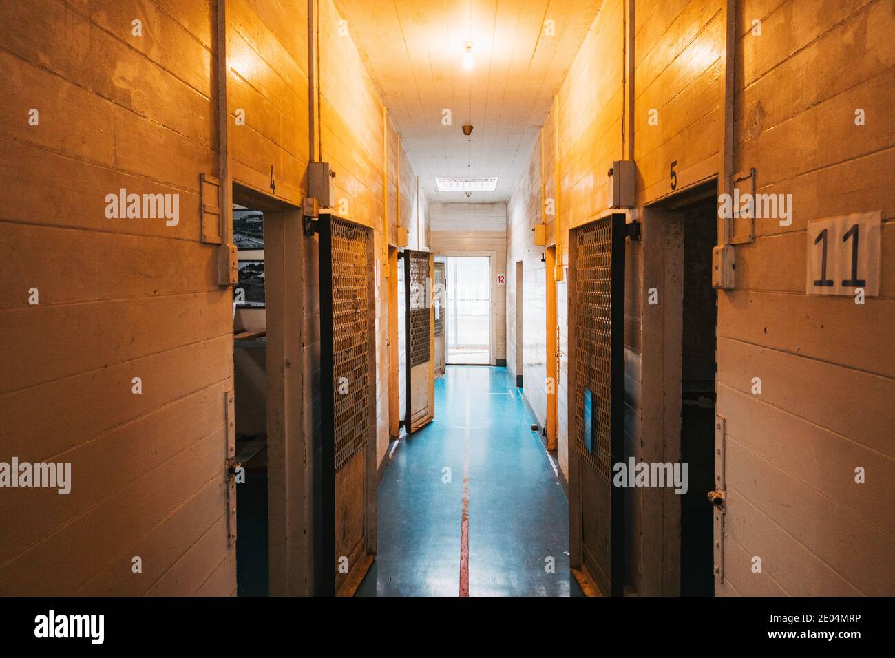 A cell block corridor inside the now disused Napier Prison, New Zealand ...