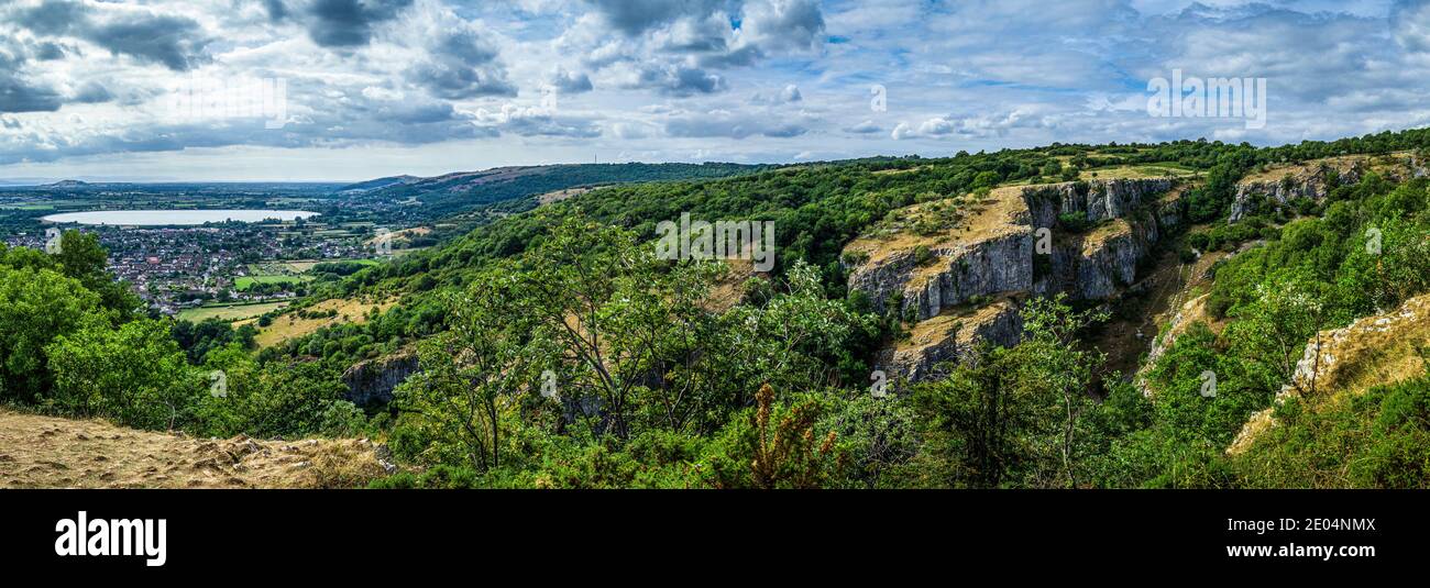 Panoramic view of Cheddar Gorge across to Cheddar village and Cheddar ...