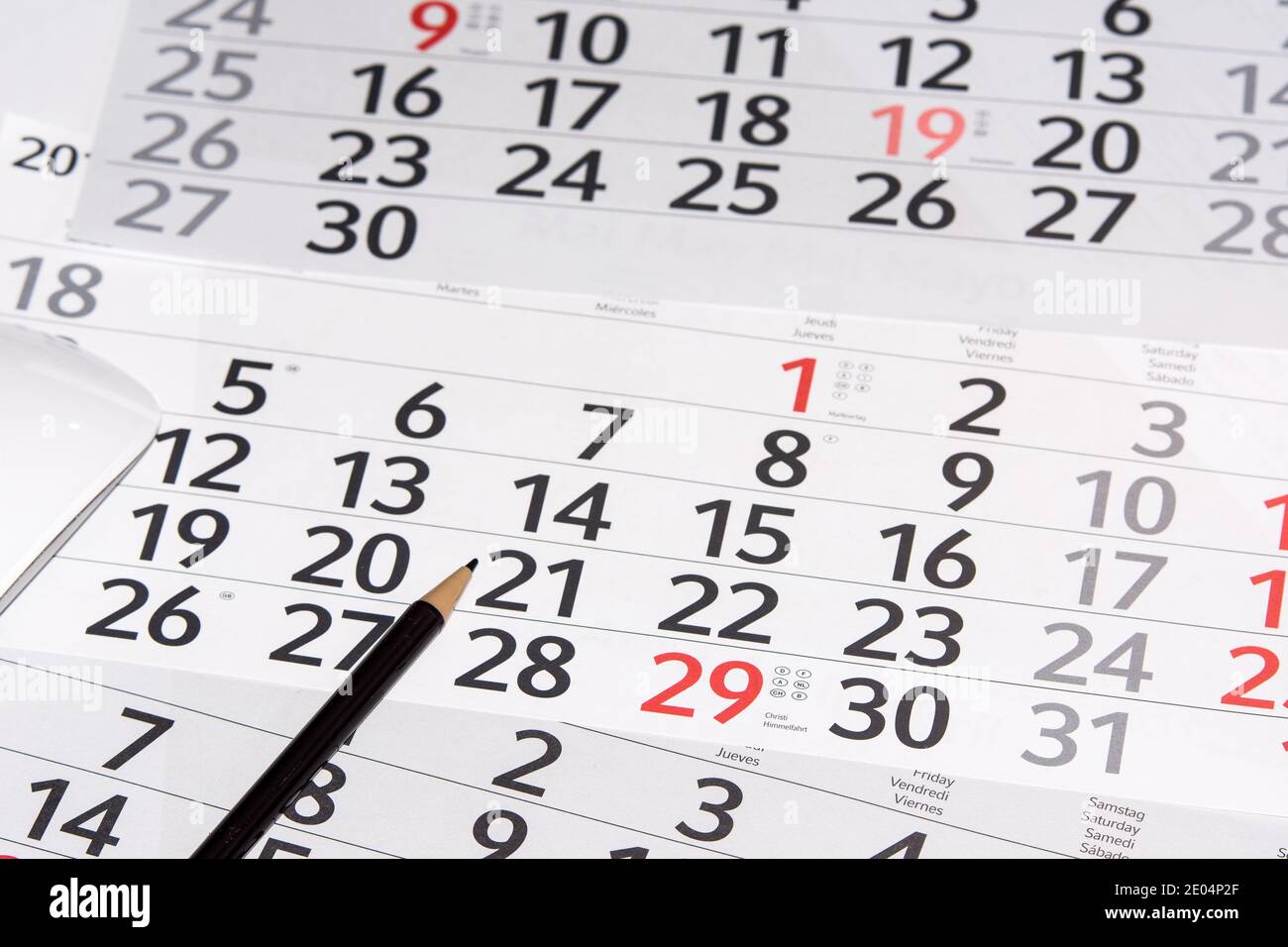 calendar with month, day and pen Stock Photo - Alamy