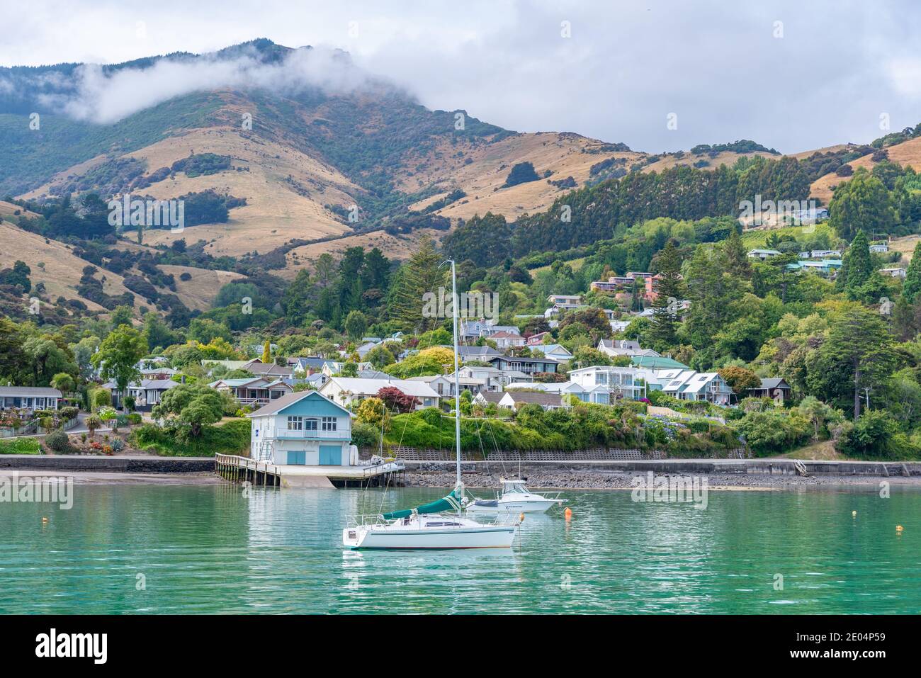 Residential houses in Akaroa at Banks peninsula, New Zealand Stock ...