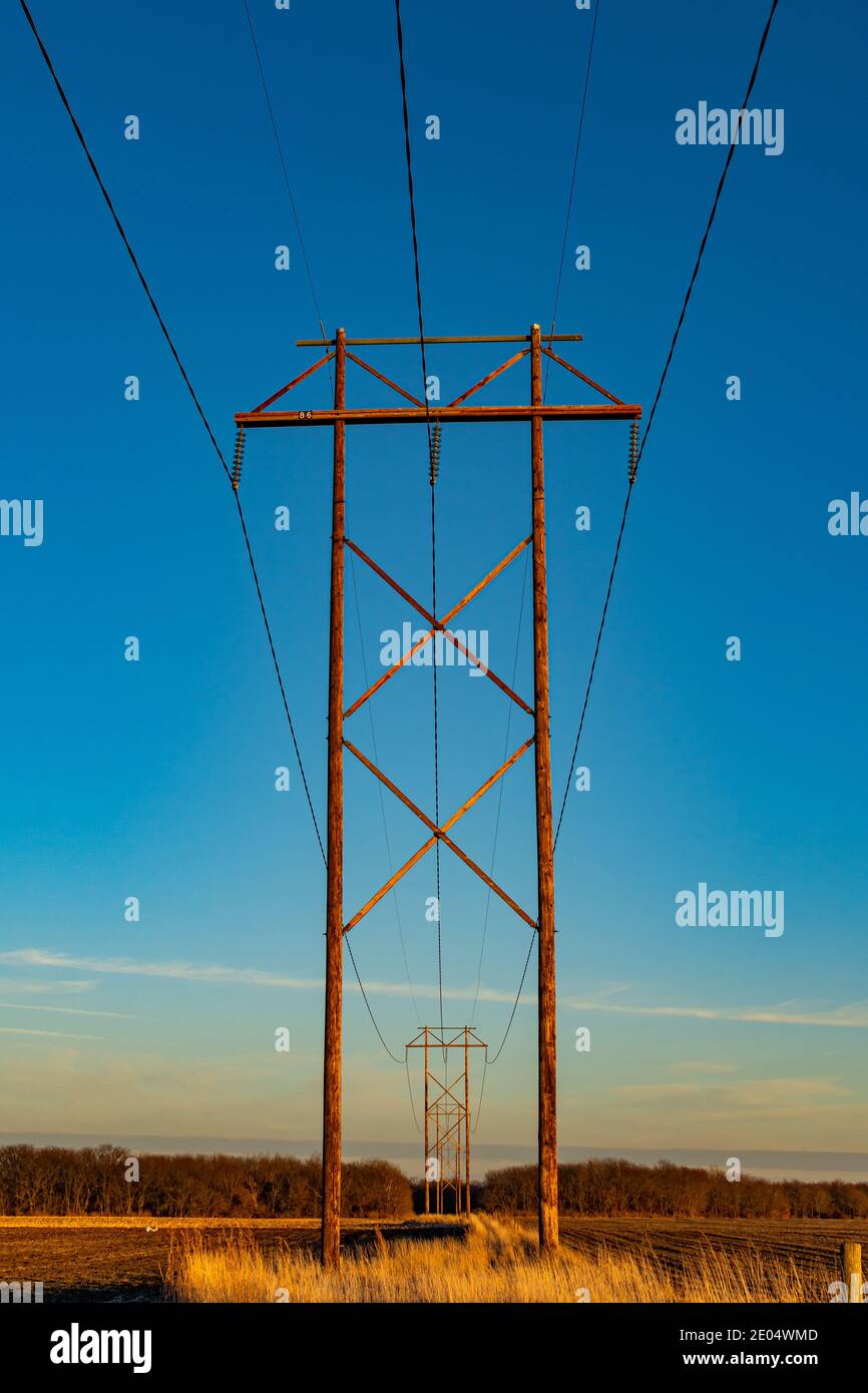 Electrical lines and wooden pylons as sunset approaches. LaSalle County ...