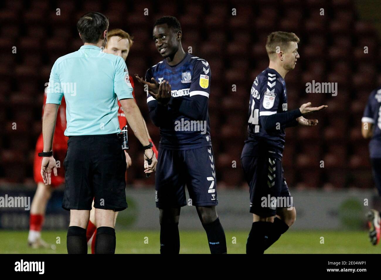 London, UK. 29th Dec, 2020. Referee, Craig Hicks is spoken to by Elvis ...