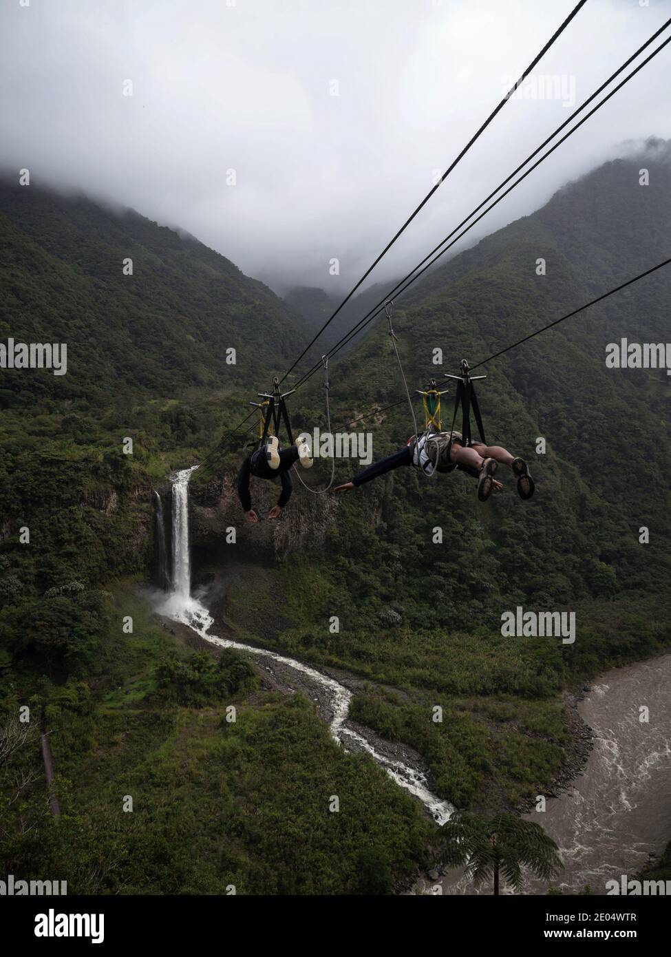 Tourists on zipline adventure ride at Manto de la novia Bridal Veil ...