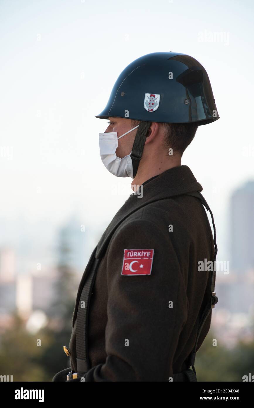 A Turkish military guard wearing a mask stands on guard at the An ...