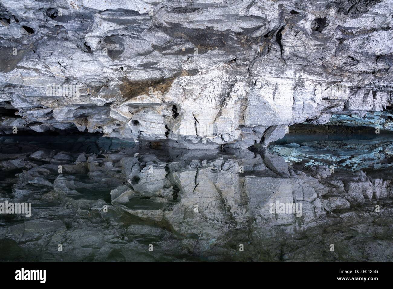 Underground Lake Inside the Ice Cave. Slope of the mountain with the ...