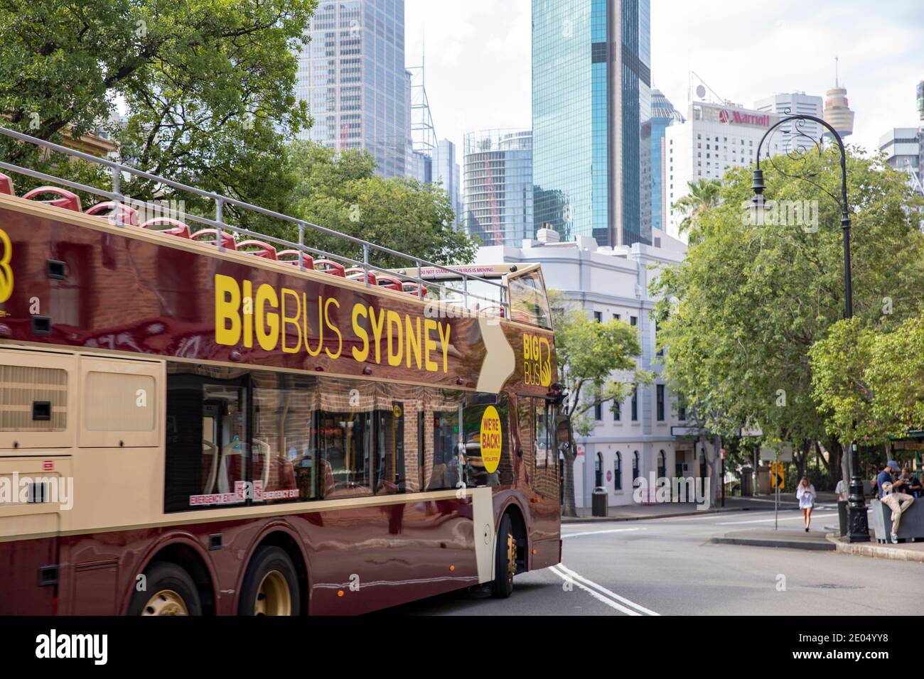 Open top Big Bus Sydney travels along George Street in Sydney city ...