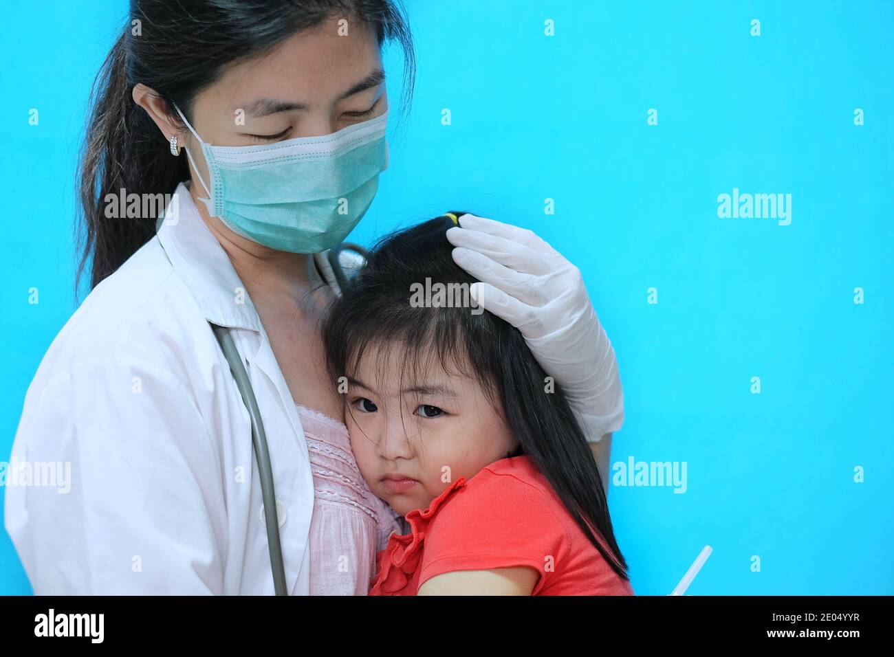 A cute young Asian girl feeling scared and nervous before getting ...