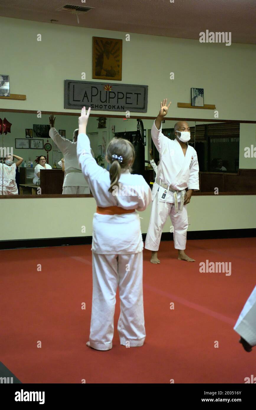 This action photo is of my daughter in her Karate class. Karate is a ...