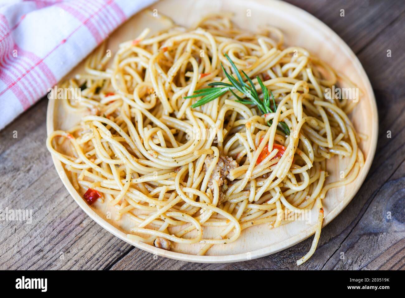 spaghetti pasta on tray wooden table background easy cooking at home ...
