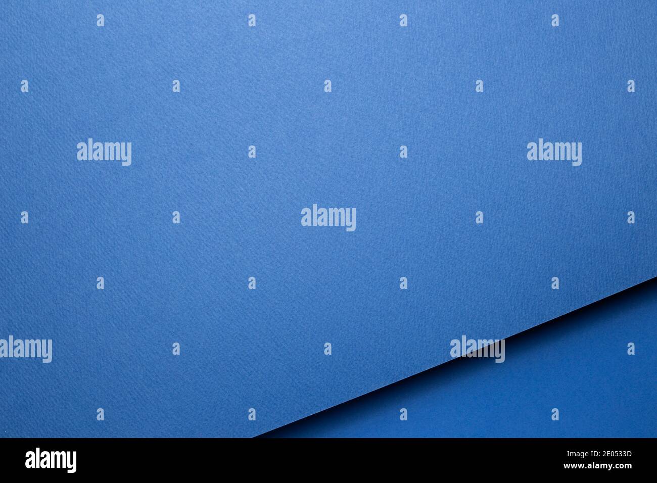 Abstract blue layered color paper background Stock Photo - Alamy