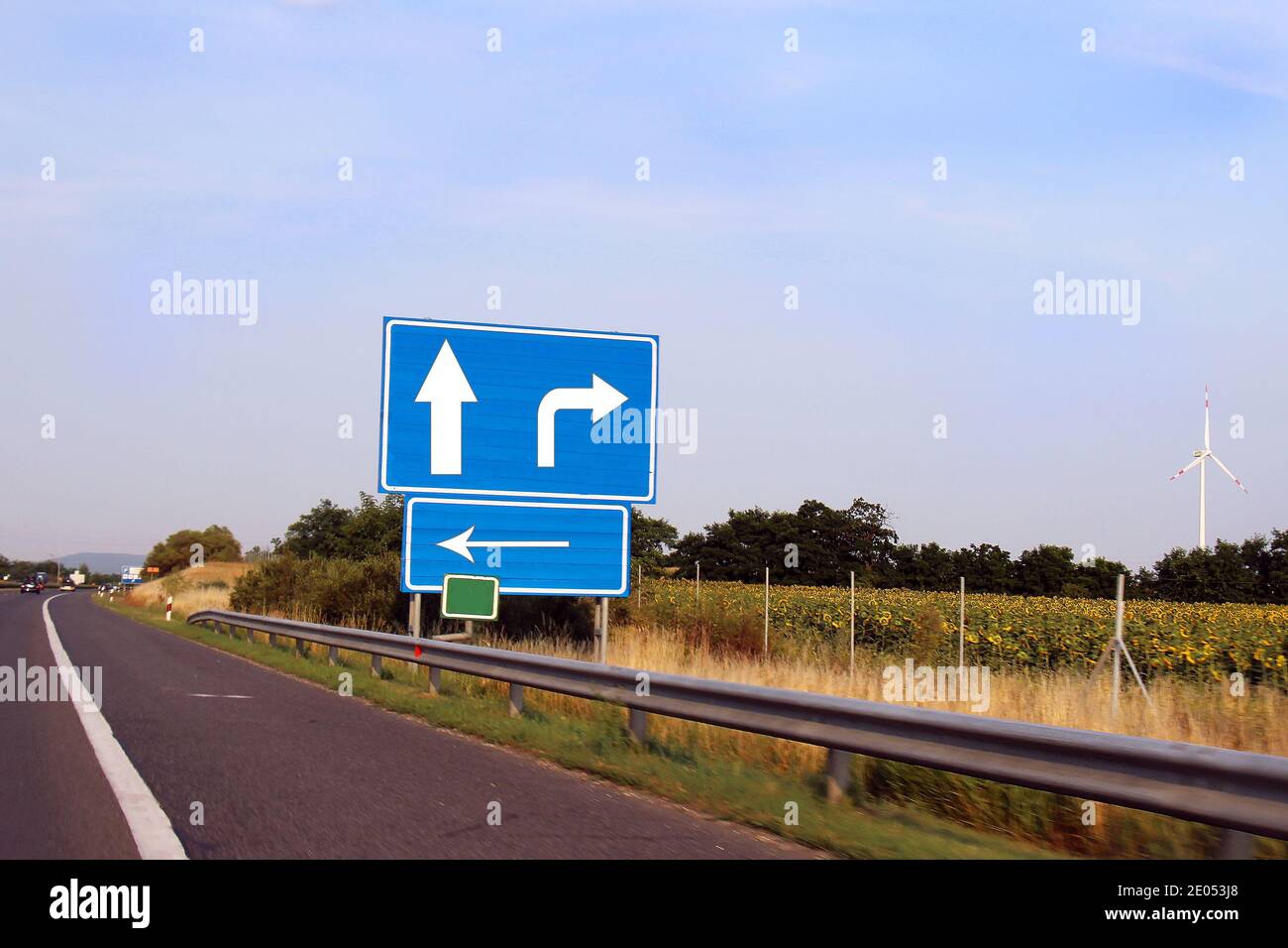 Empty highway road asphalt with directional signs arrows Stock Photo ...