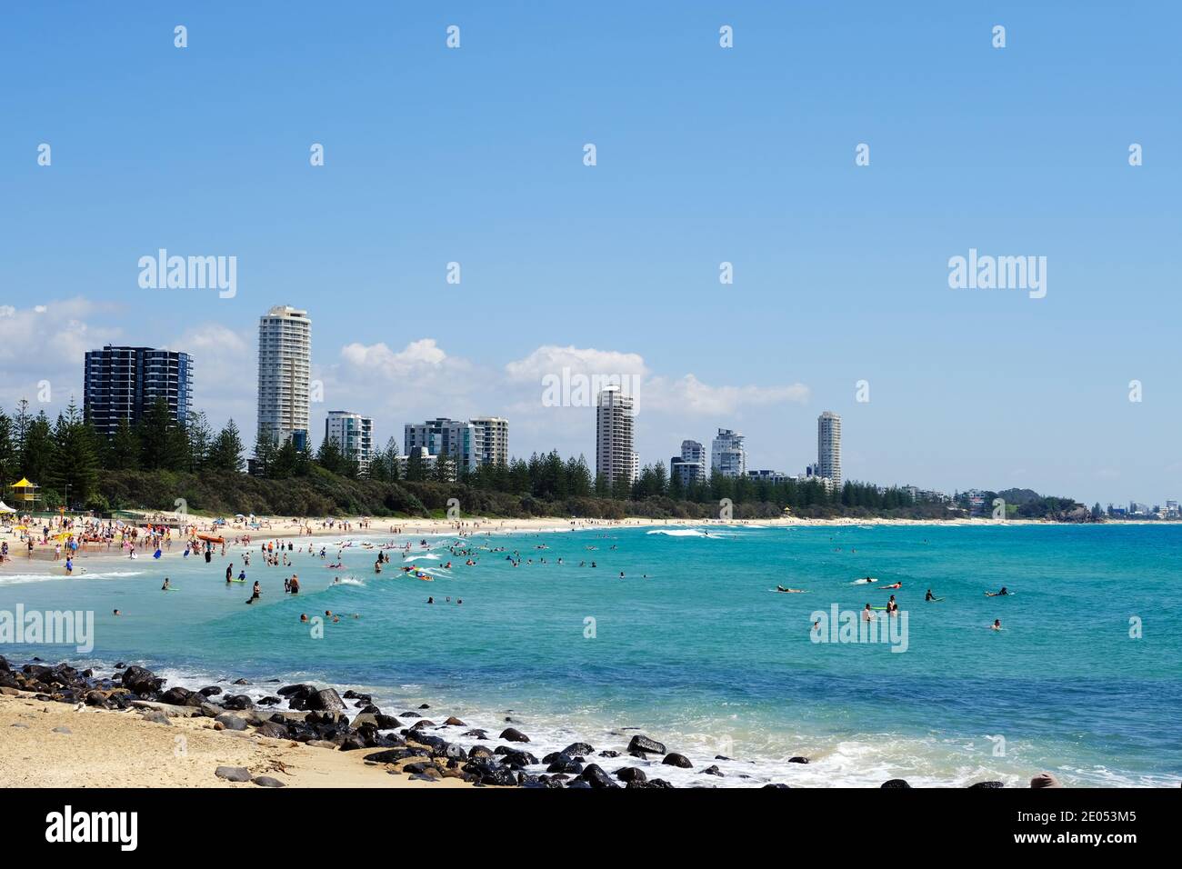 People enjoying the surrounds of Burleigh Heads beach in Australia ...