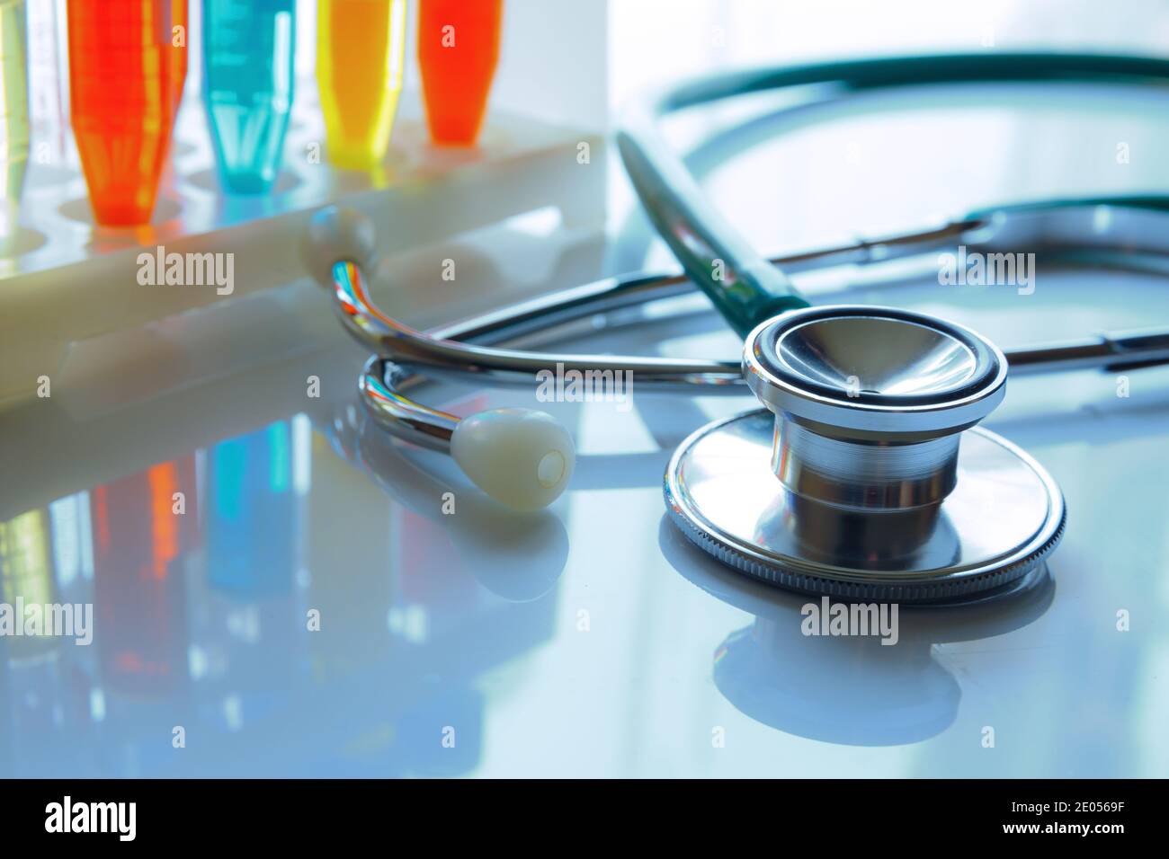 Stethoscope and test tubes with reflection, medical concept Stock Photo ...