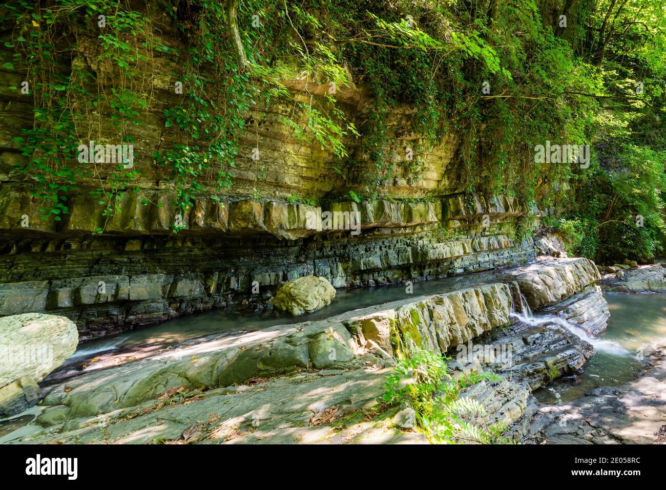 Textures of various stone layers in mountain river Stock Photo - Alamy