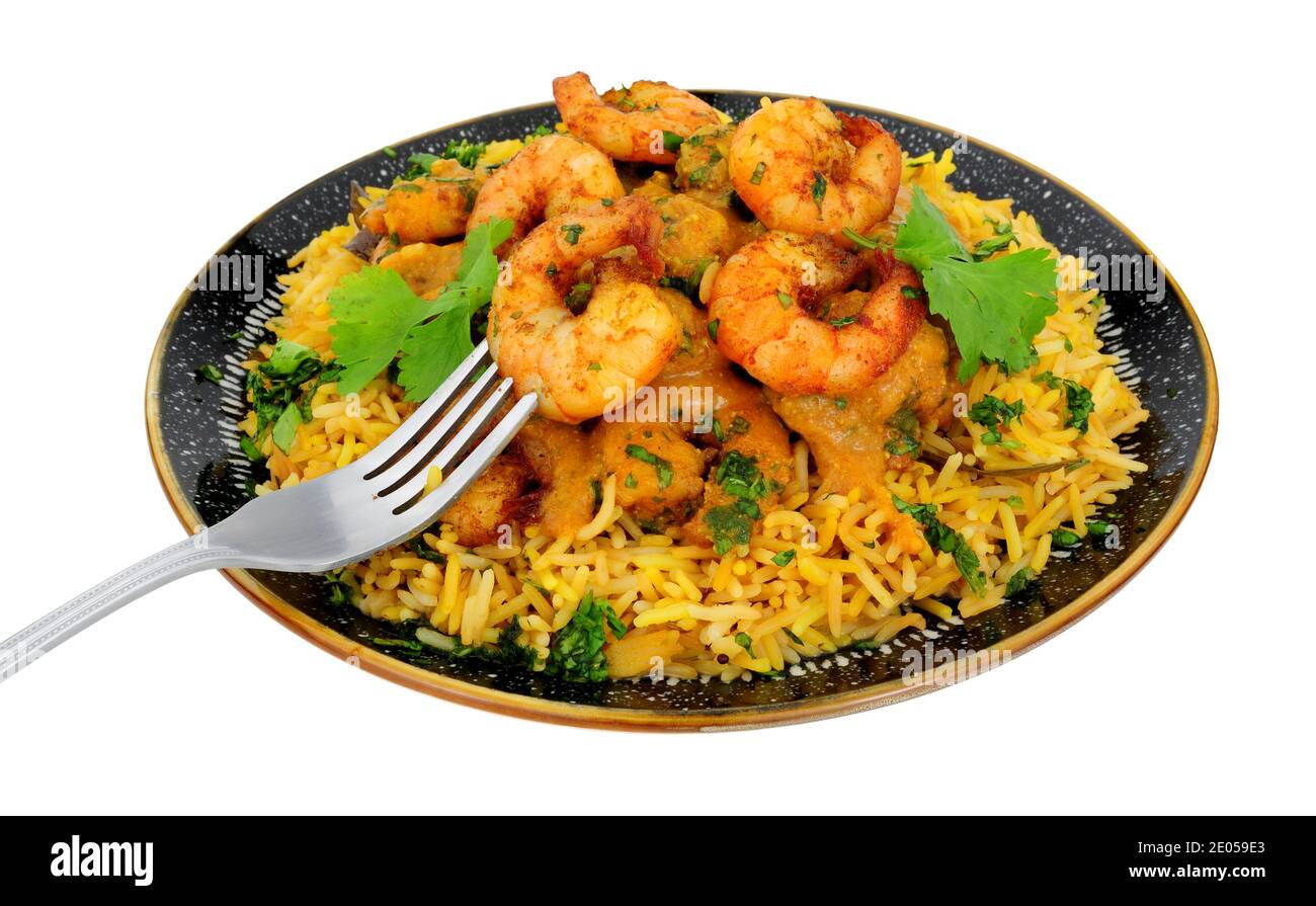 King prawn curry and rice meal isolated on a white background Stock ...