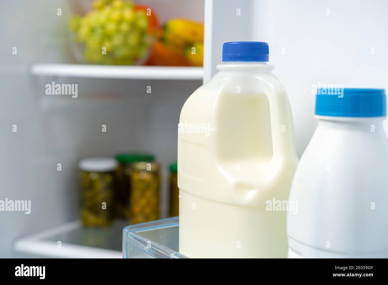 Open fridge full of fresh food and drinks Stock Photo - Alamy