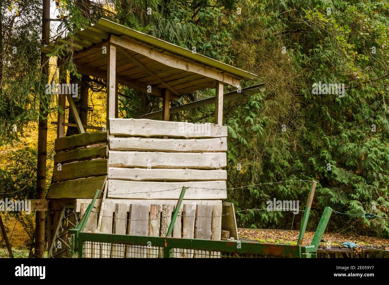 Wooden raised hide for hunting and observation of wildlife near a ...