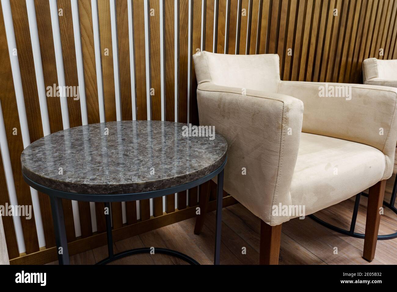 Office waiting area with arm chairs and coffee table Stock Photo - Alamy