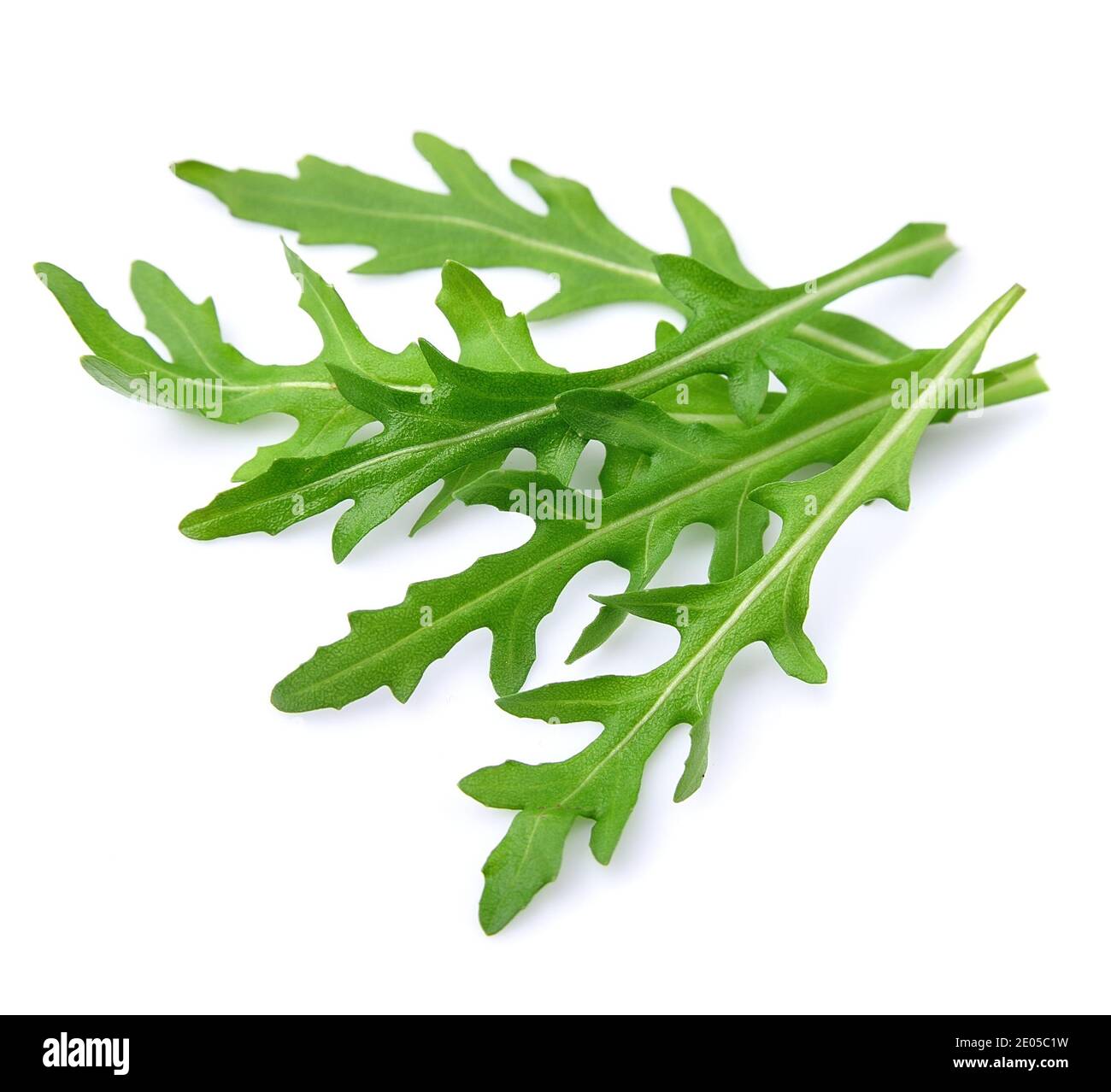 Arugula leaves isolated on white Stock Photo - Alamy