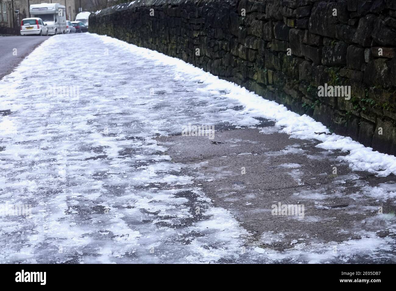 An icy pavement in New Mills, Derbyshire the day after the first ...